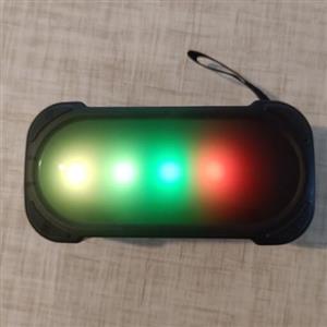 قیمت و خرید اسپیکر بلوتوثی ZQS1205 رنگ مشکی به همراه کابل شارژ
